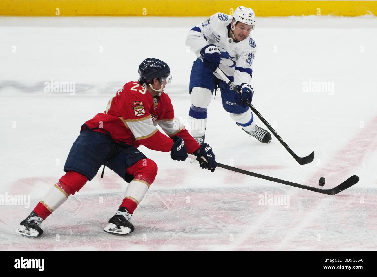 Tampa Bay Lightning center Yanni Gourde (37) passes the puck as Florida ...