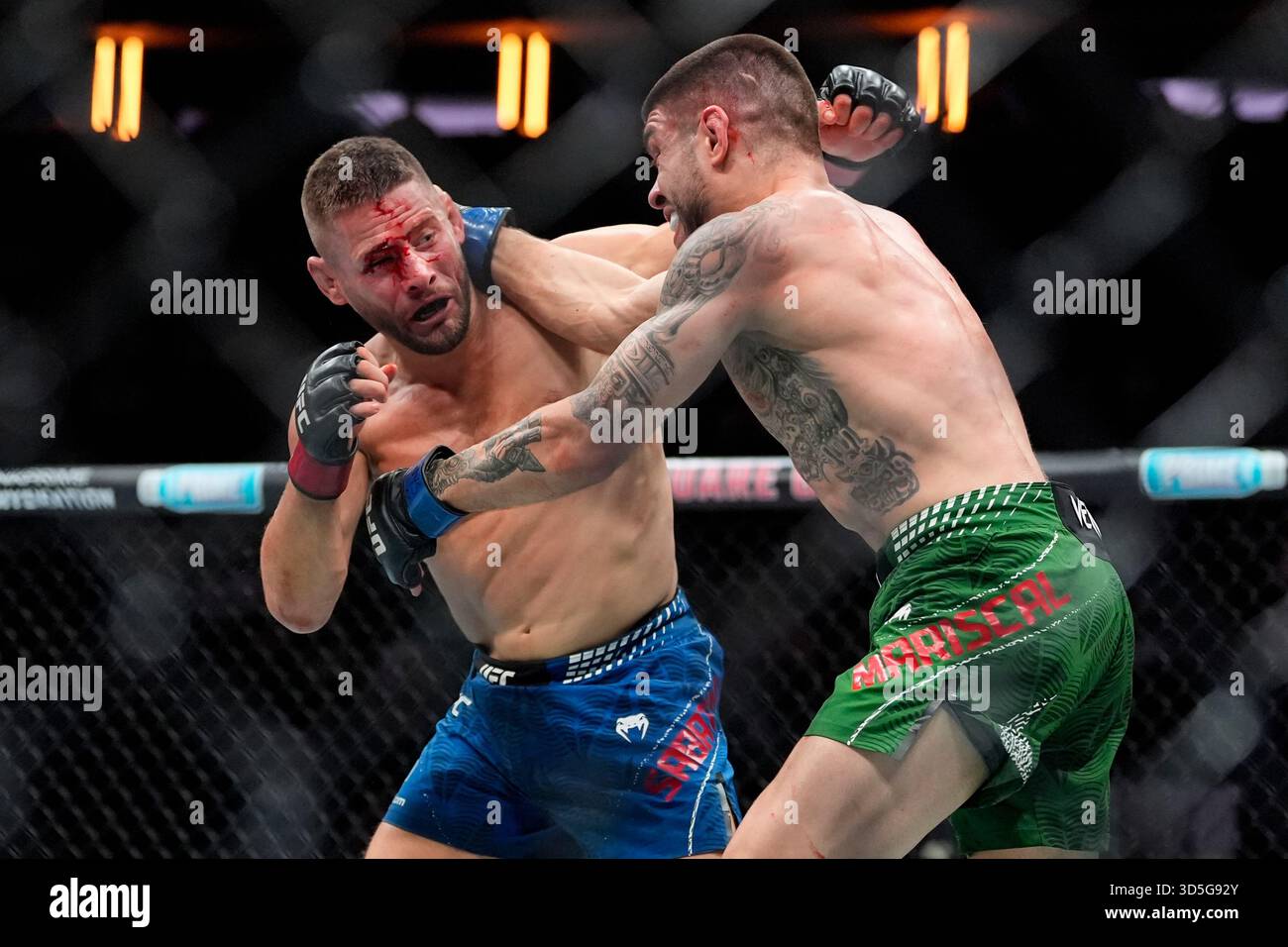 Pat Sabatini, left, and Chepe Mariscal battle during the third round of ...