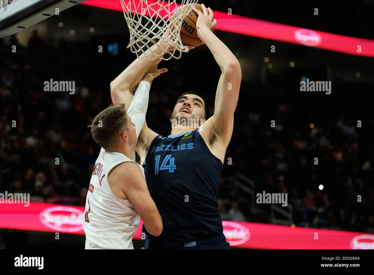 Memphis Grizzlies center Zach Edey (14) shoots as Cleveland Cavaliers ...