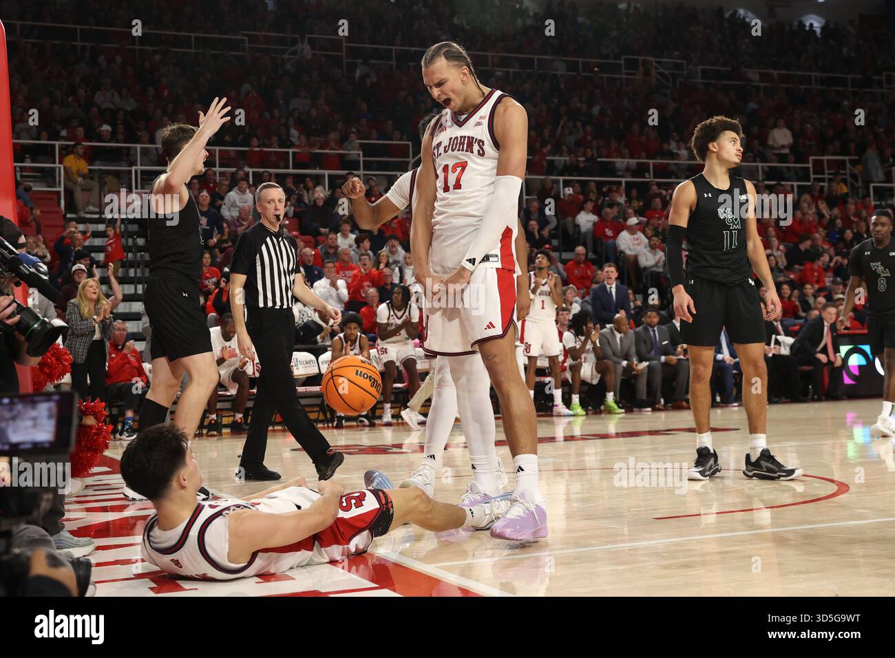 St. John's forward Rubén Prey (17) reacts after St. John's guard Dylan ...