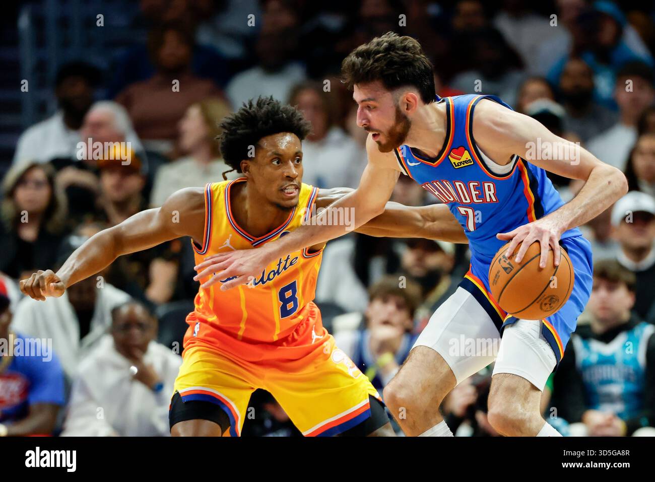 Oklahoma City Thunder center Chet Holmgren (7) drives against Charlotte ...
