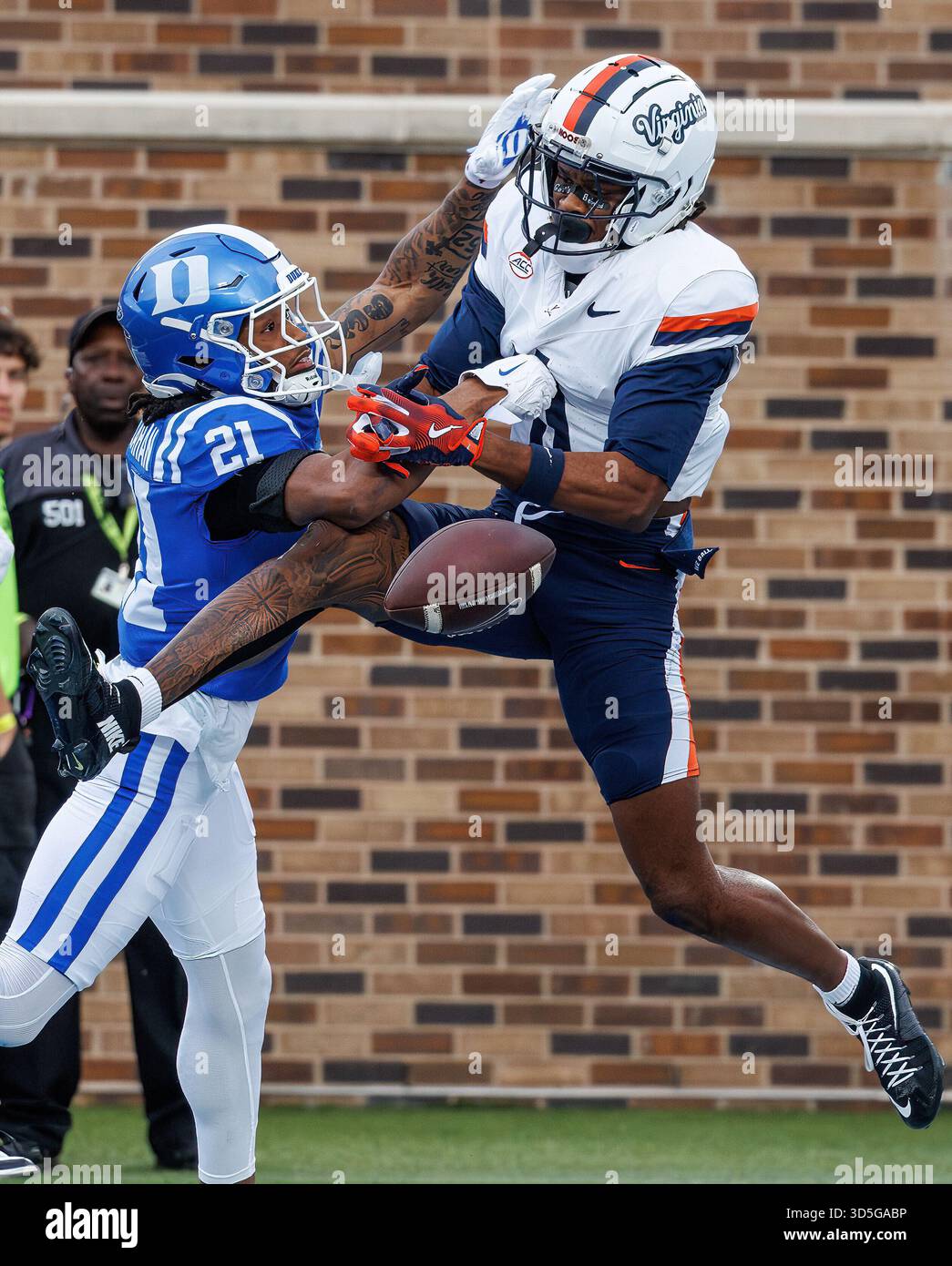 Virginia's Trell Harris, right, fails to complete a catch as Duke's ...