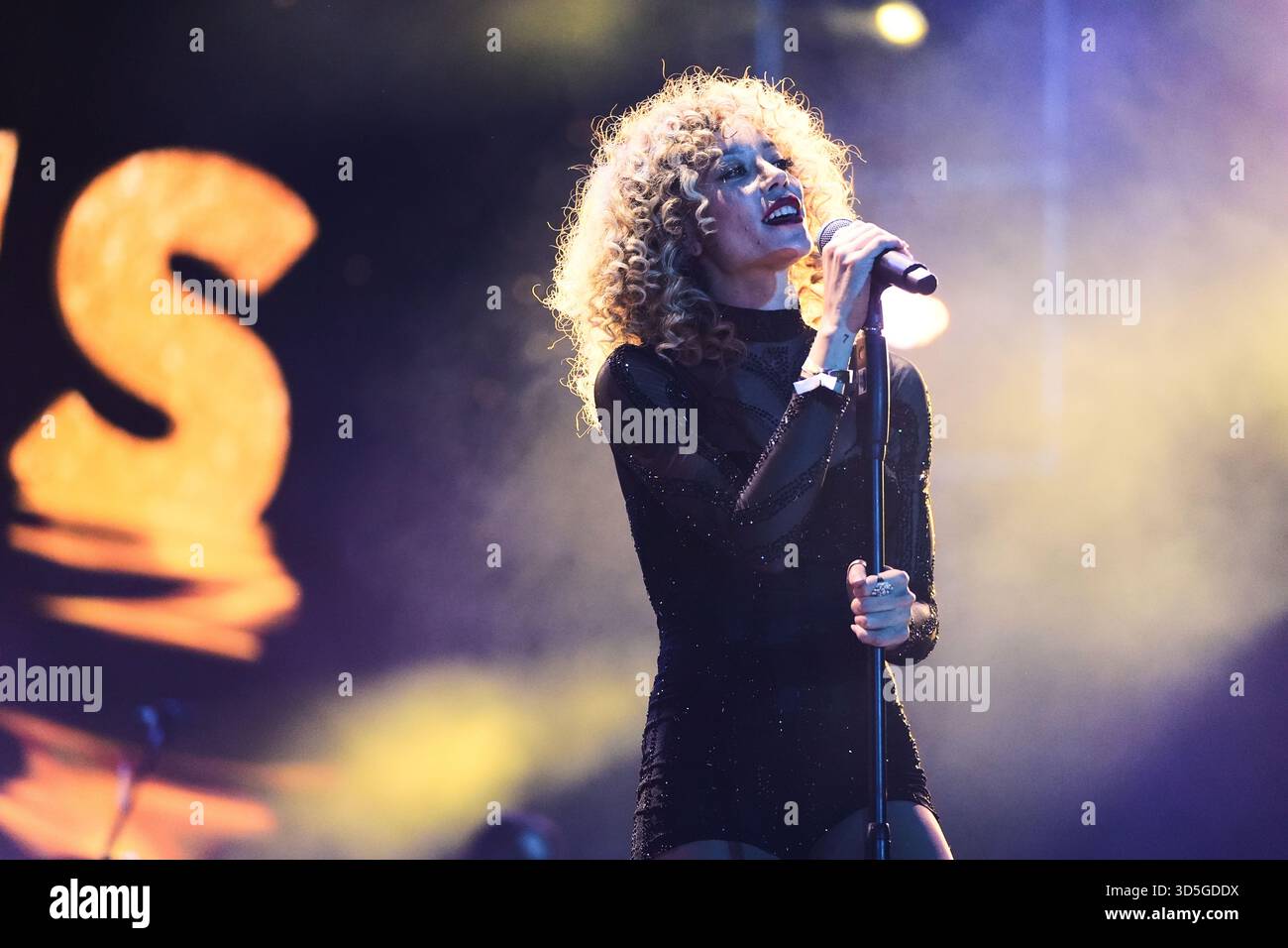Michelle Joy, vocalist of the band Cannons, performs during the Corona ...