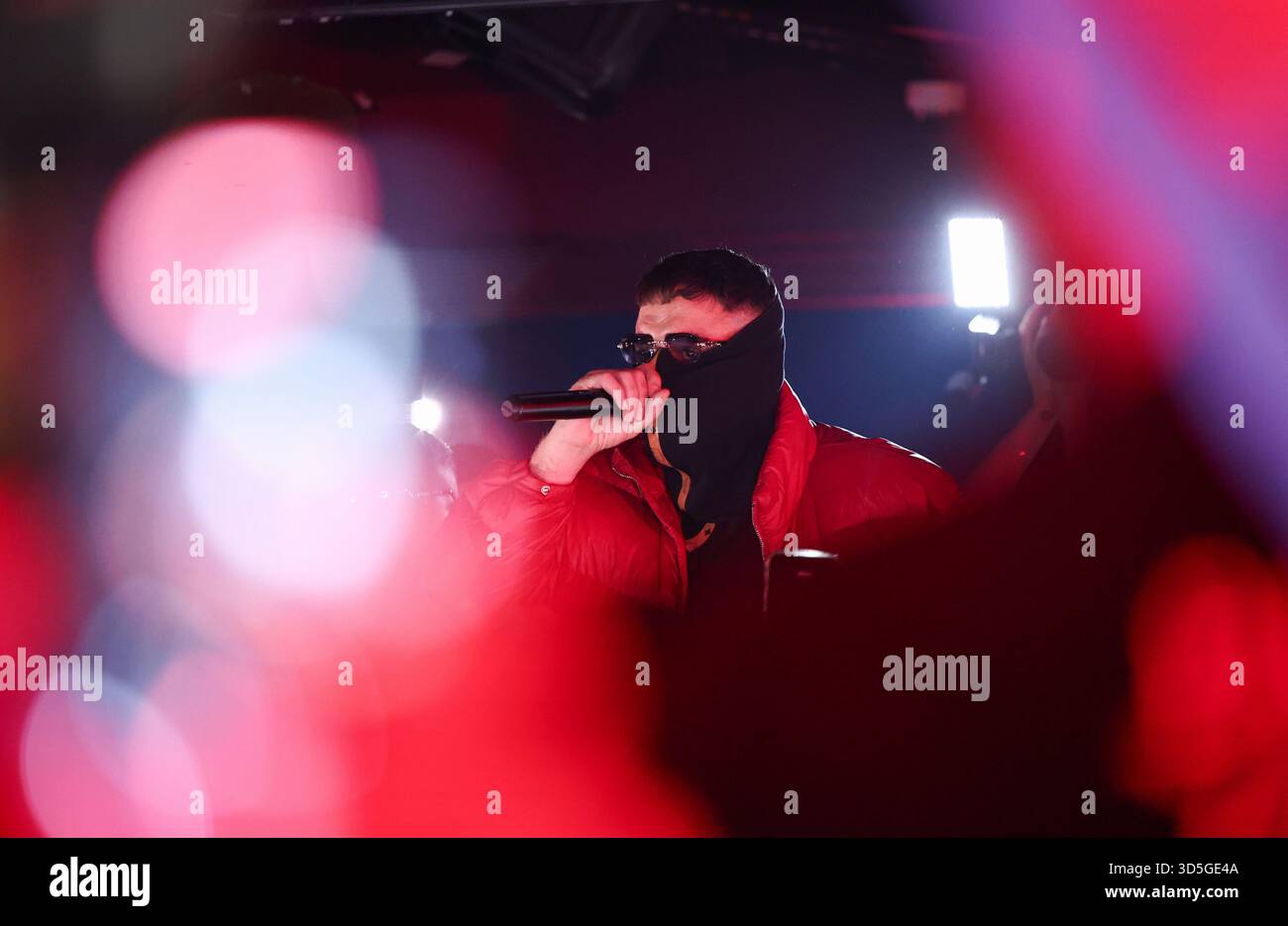 16 November 2025, Hesse, Gießen: Rapper Haftbefehl performs at La Louve ...