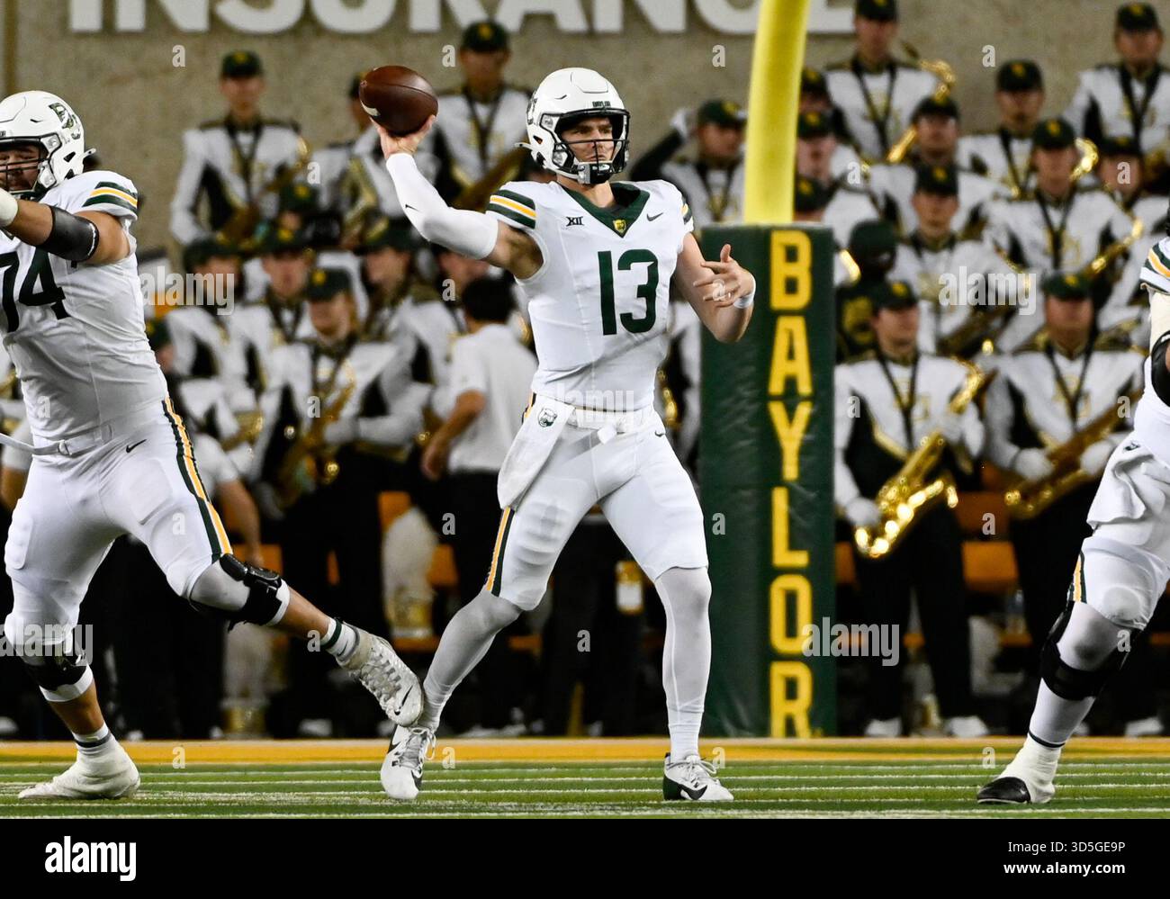 November 15, 2025 Baylor Bears quarterback Sawyer Robertson (13) drops ...