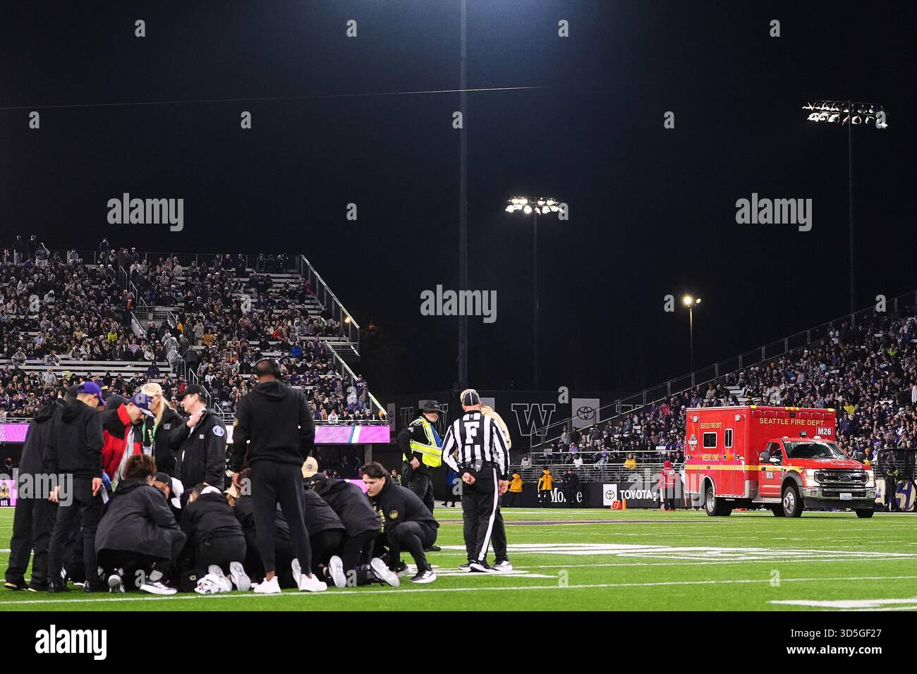 An ambulance enters the field to take Washington wide receiver Raiden ...