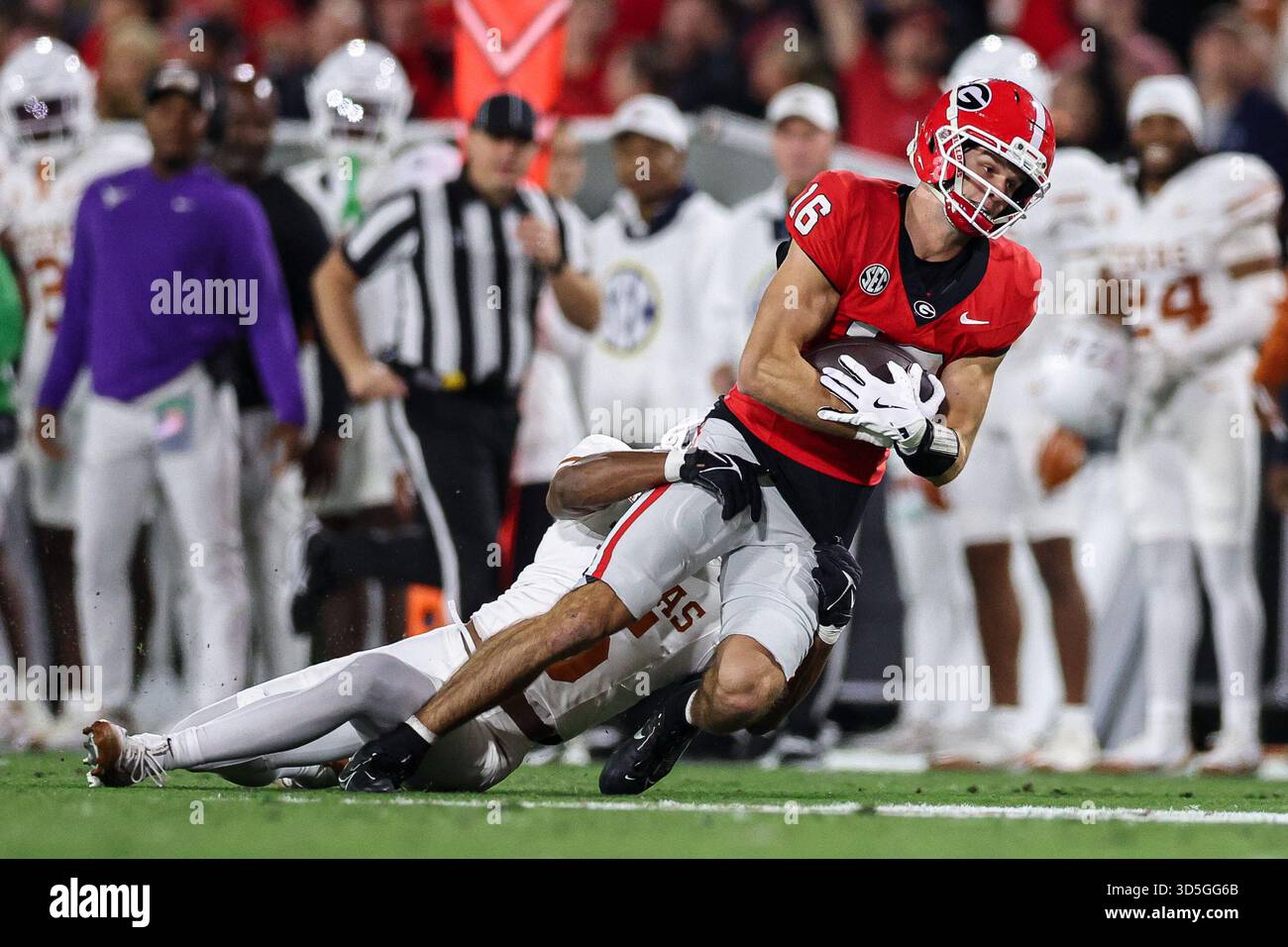Georgia wide receiver London Humphreys (16) gets tackled by Texas ...