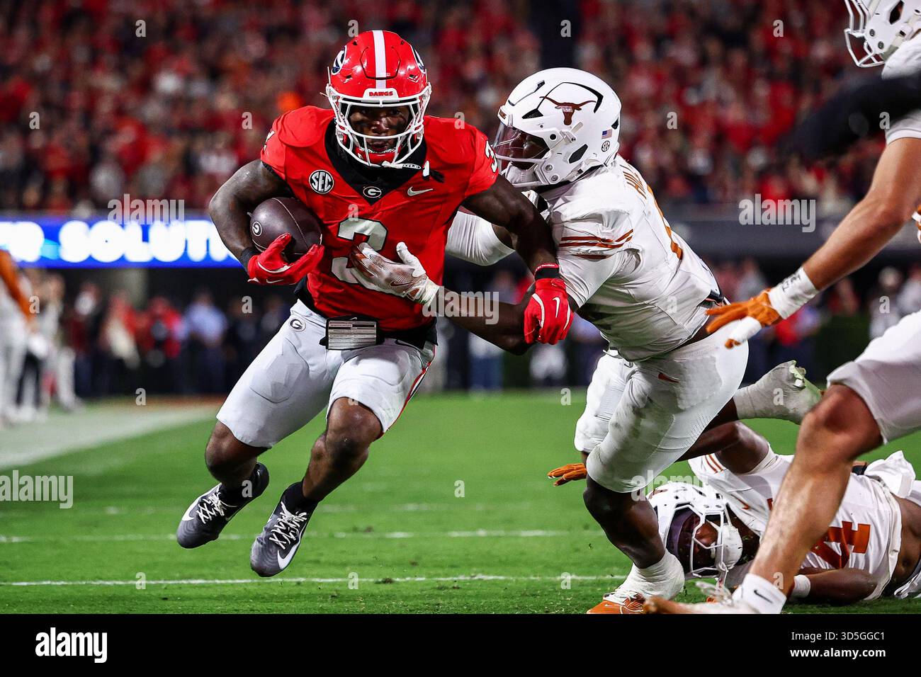 Georgia running back Nate Frazier (3) runs with the ball during the ...