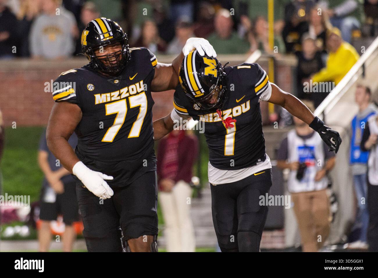 Missouri offensive lineman Curtis Peagler (77) celebrates the touchdown ...