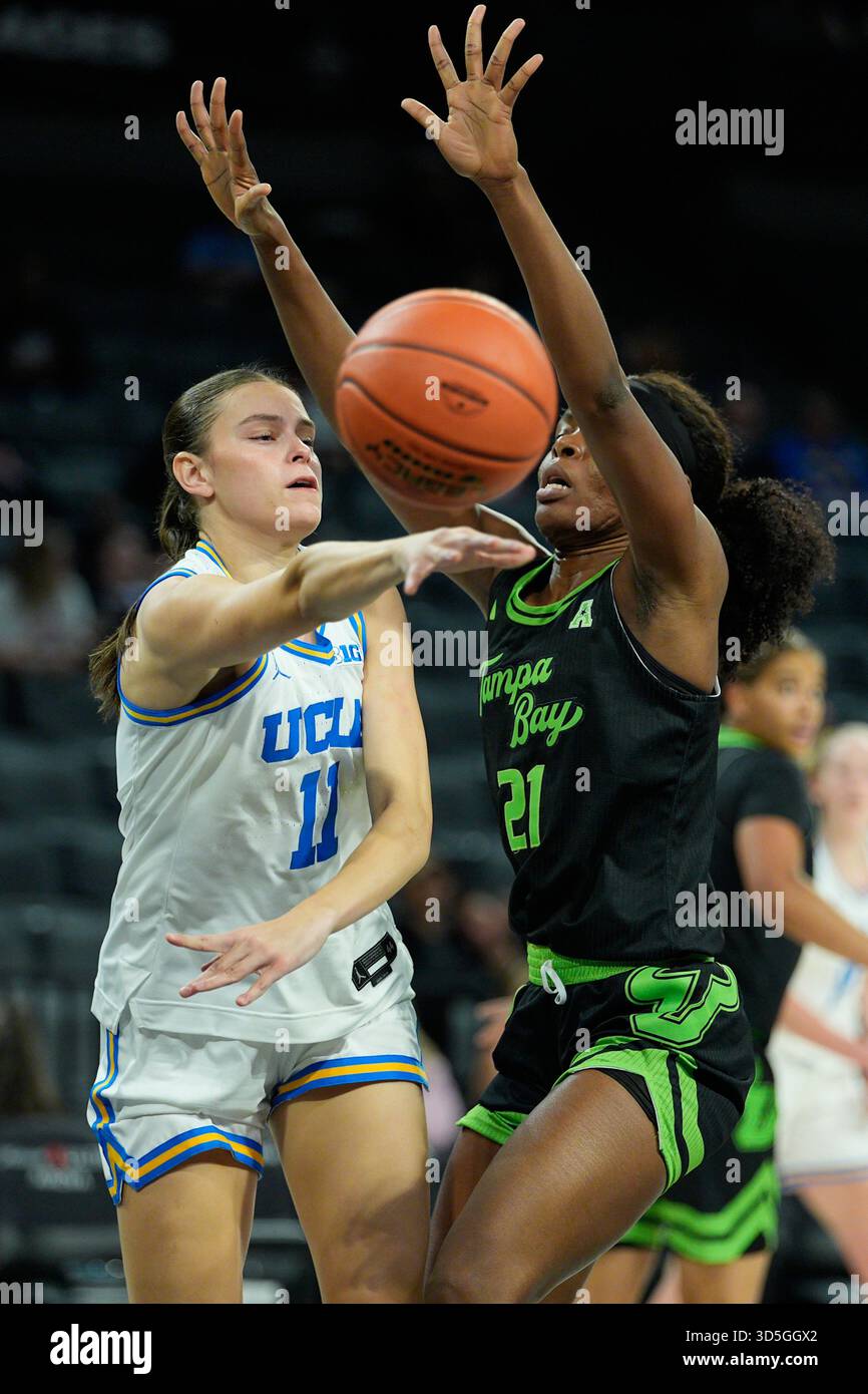 UCLA forward Gabriela Jaquez (11) passes around South Florida forward L ...