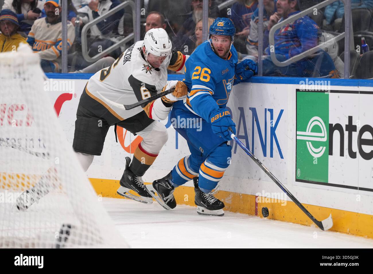 Vegas Golden Knights' Kaedan Korczak (6) and St. Louis Blues' Nathan ...