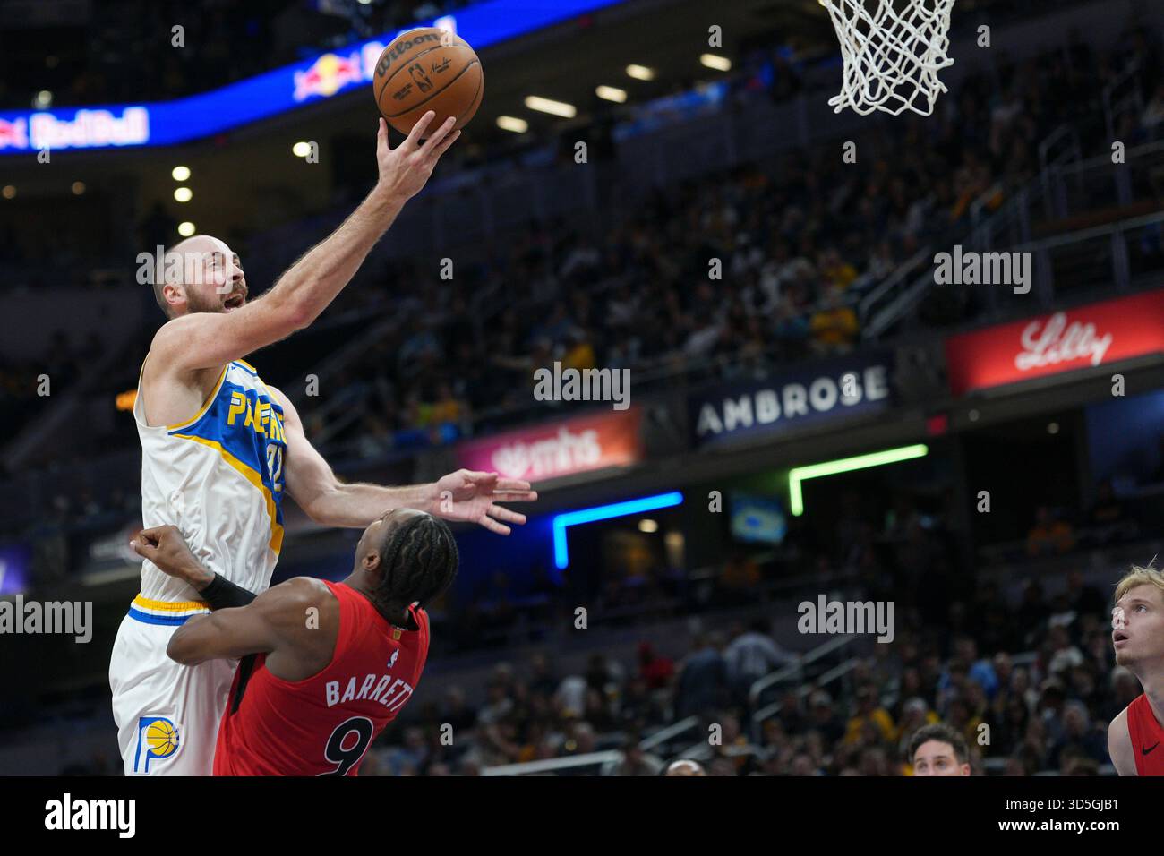 Indiana Pacers center Jay Huff, left, shoots over Toronto Raptors ...