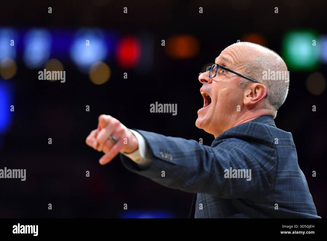 UConn head coach Dan Hurley shouts to his players from the bench in the ...
