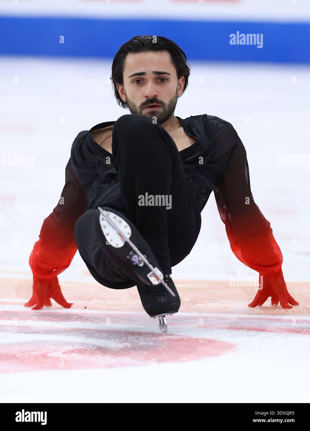 Kevin AYMOZ of France performs in the men's free program of the ISU ...