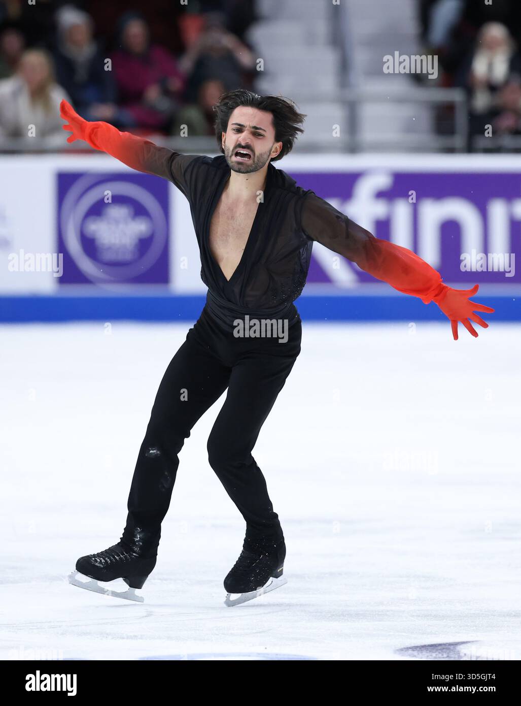 Kevin AYMOZ of France performs in the men's free program of the ISU ...