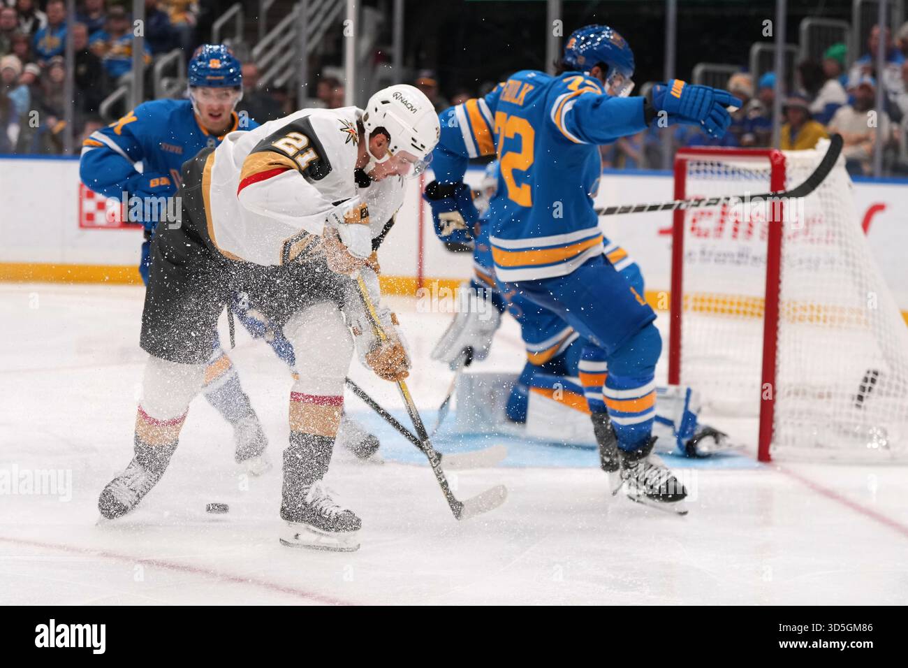 Vegas Golden Knights' Brett Howden (21) and St. Louis Blues' Justin ...