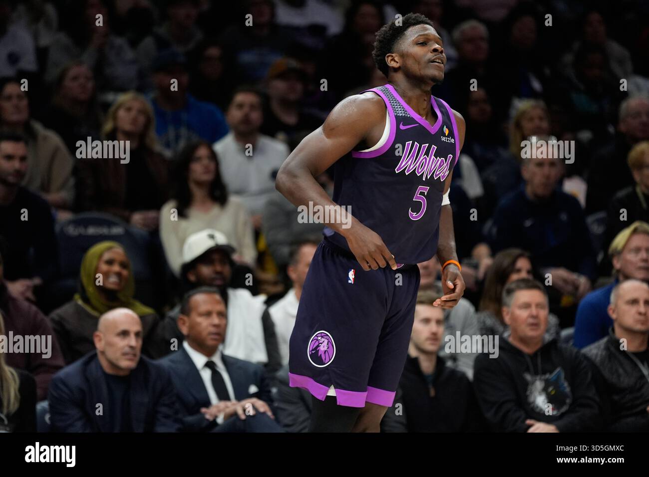 Minnesota Timberwolves guard Anthony Edwards (5) reacts after missing a ...
