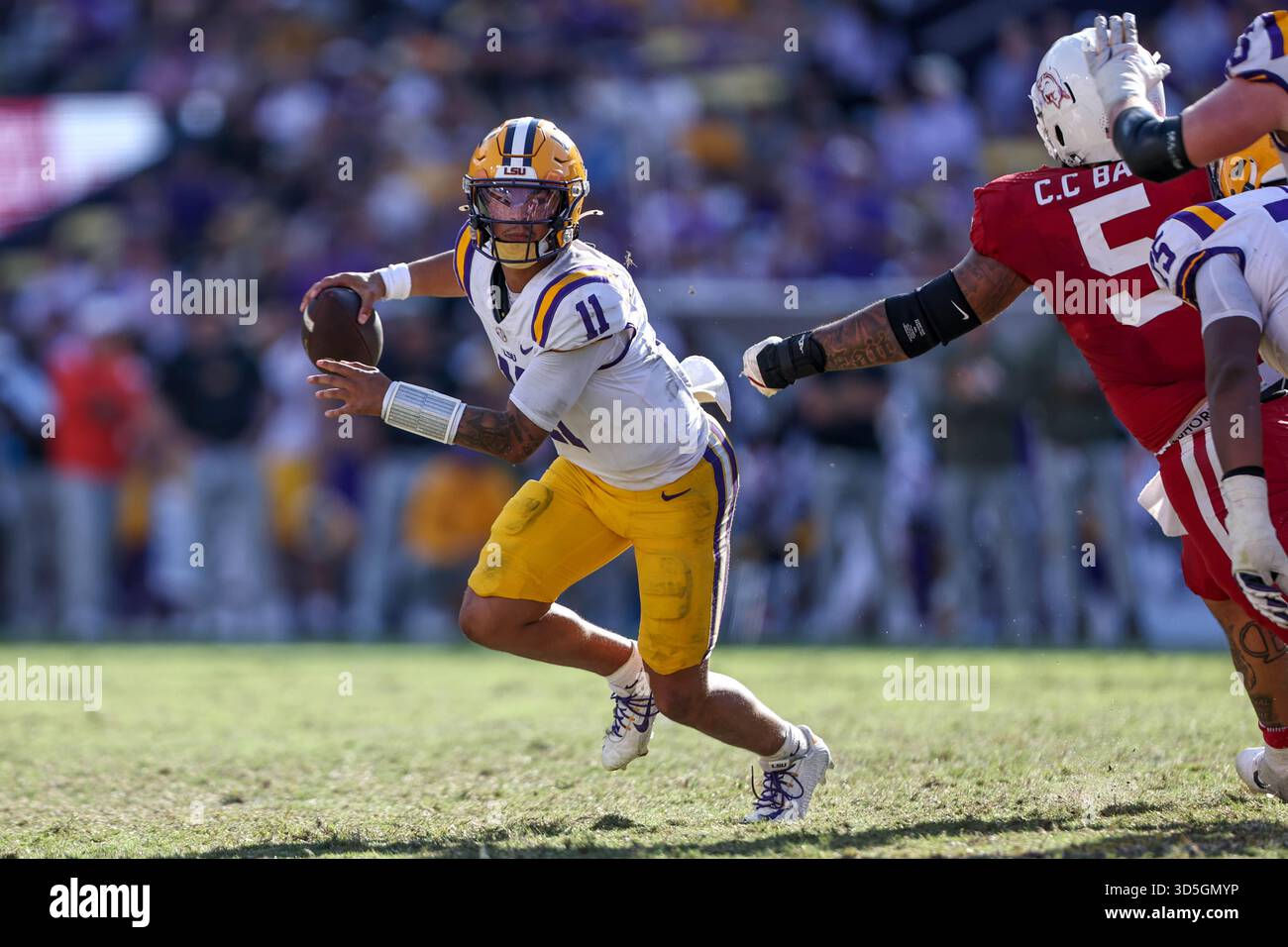 November 15, 2025: LSU quarterback Michael Van Buren Jr. (11) rolls out ...