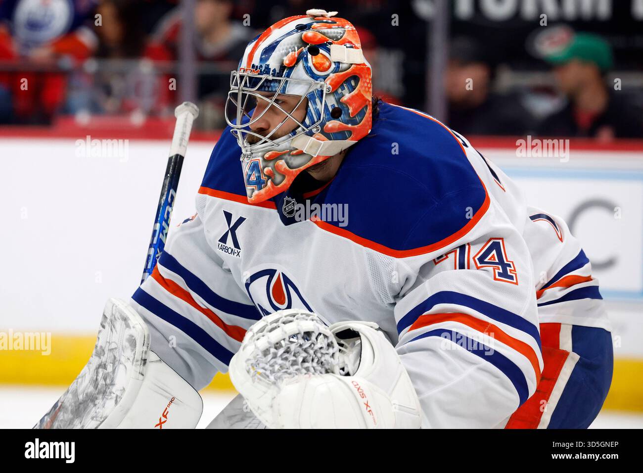 Edmonton Oilers goaltender Stuart Skinner (74) watches the puck against ...
