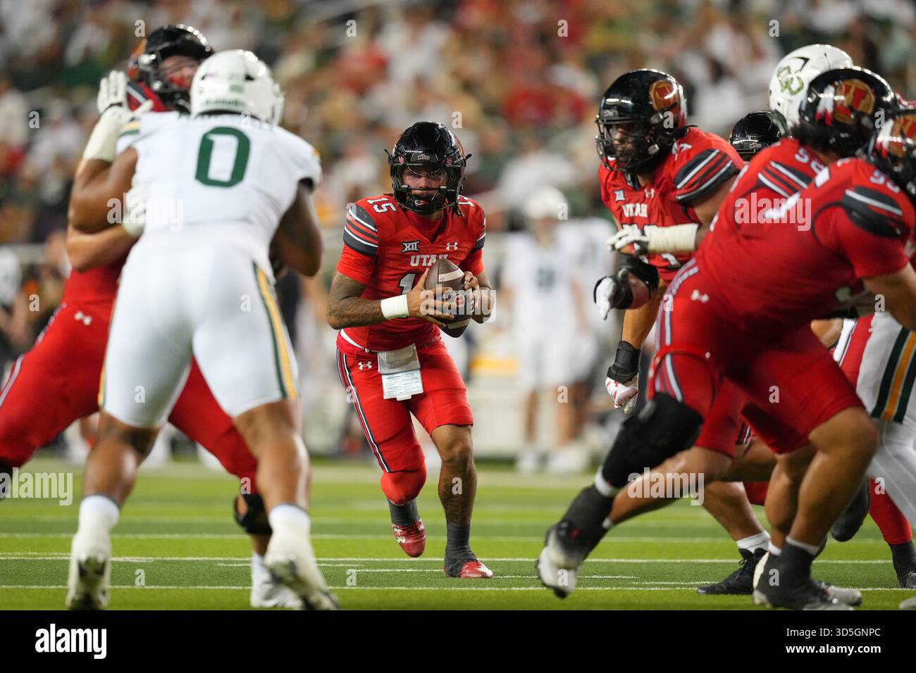 Utah quarterback Byrd Ficklin runs a play against Baylor during the ...