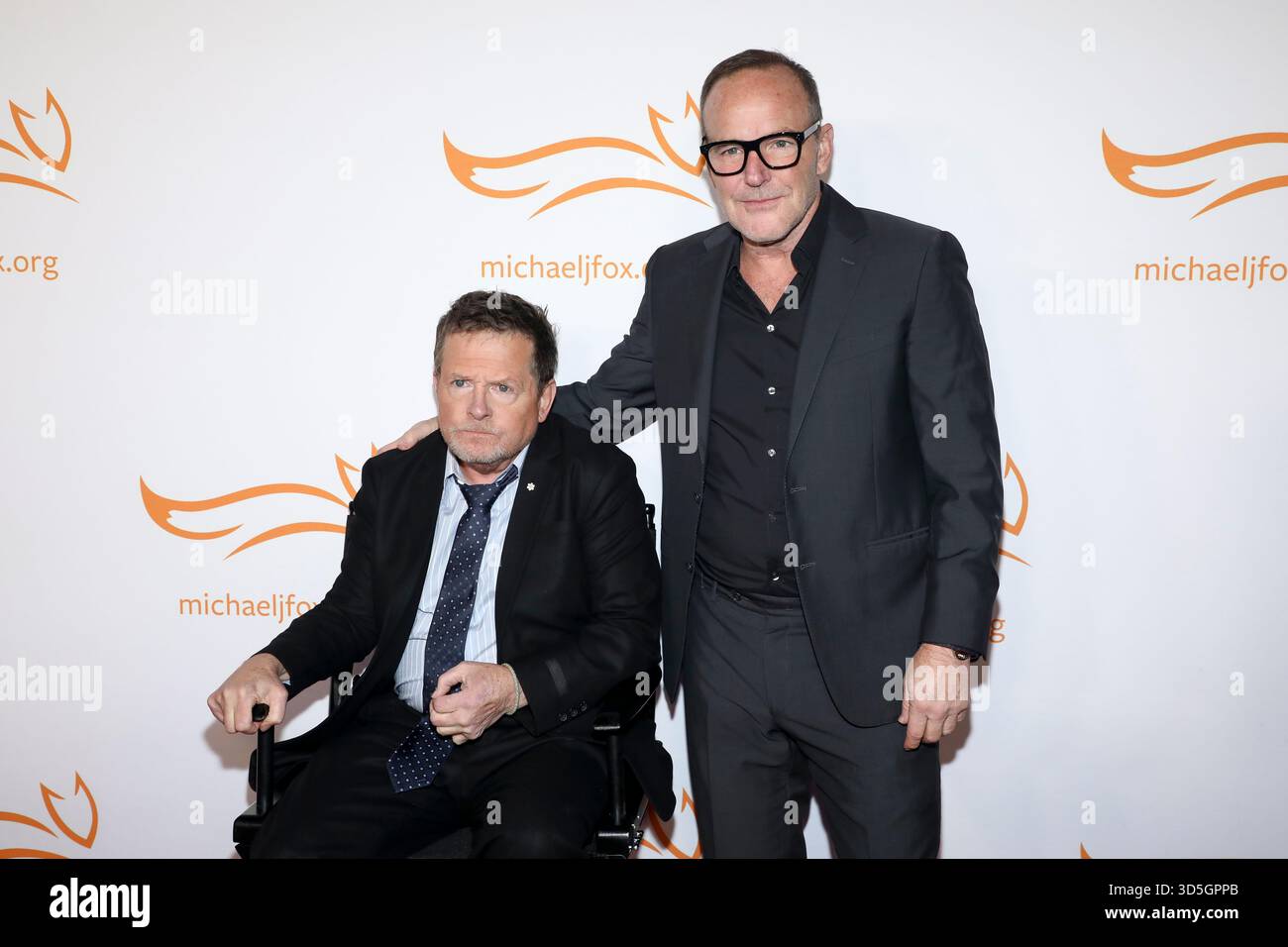 Actors Michael J. Fox, left, and Clark Gregg attend the Michael J. Fox ...