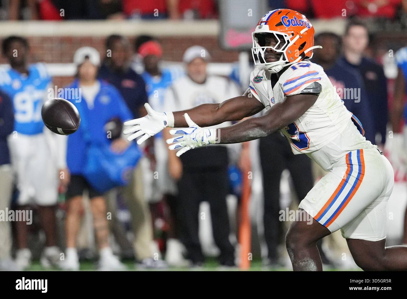 Florida running back Jadan Baugh makes a lateral pitch of the football ...