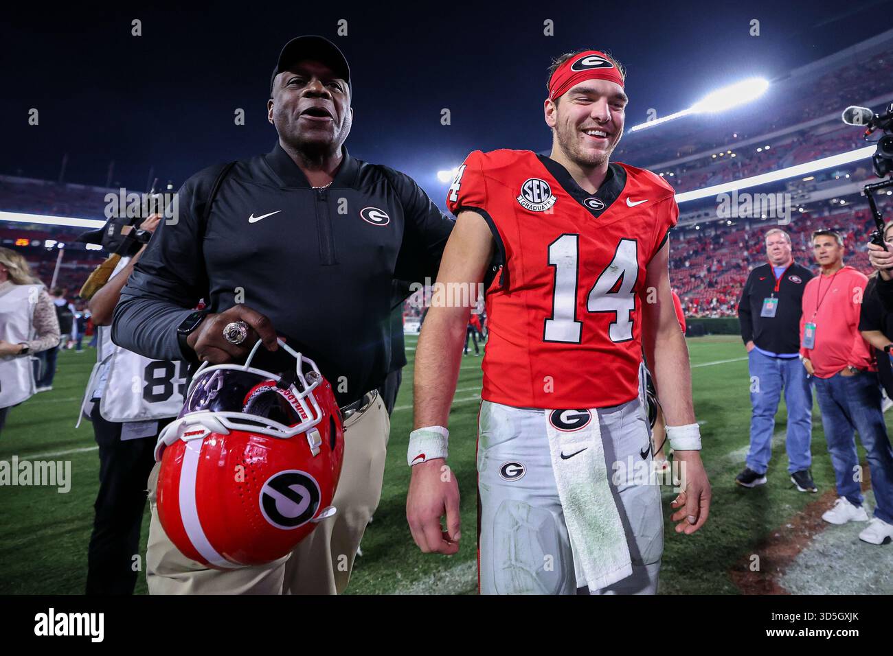 Georgia quarterback Gunner Stockton (14) reacts after an NCAA college ...
