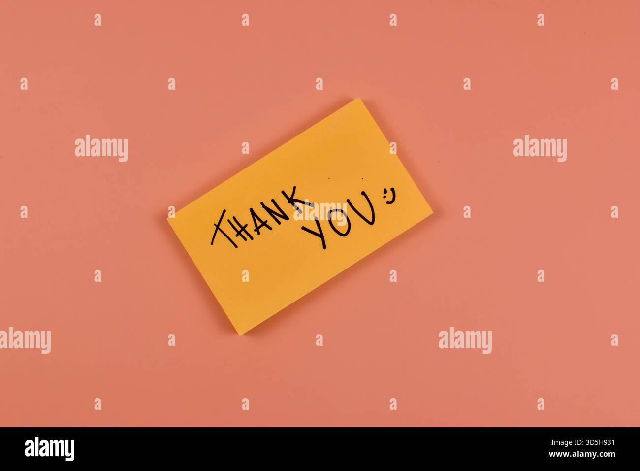 "THANK YOU" card with puzzle pieces on peach background conveys ...