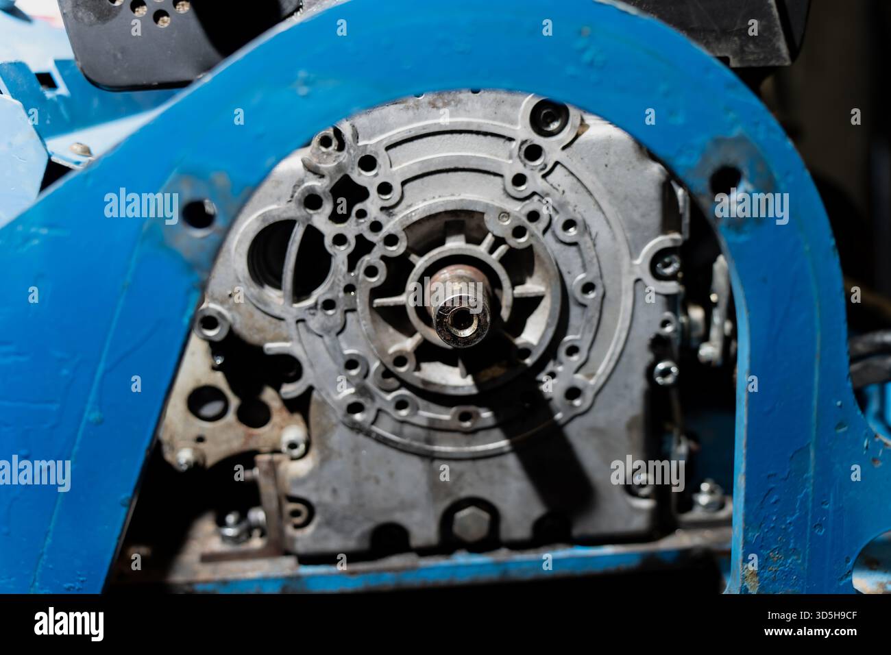 Industrial gearbox section with centered spindle, bolt openings and ...
