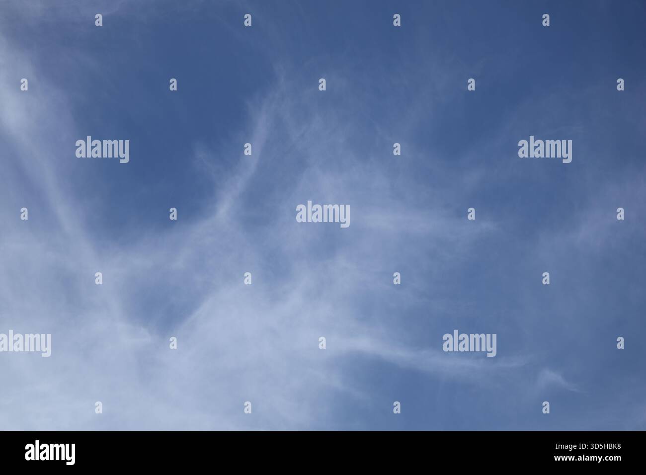 Wispy cirrus clouds across hi-res stock photography and images - Alamy