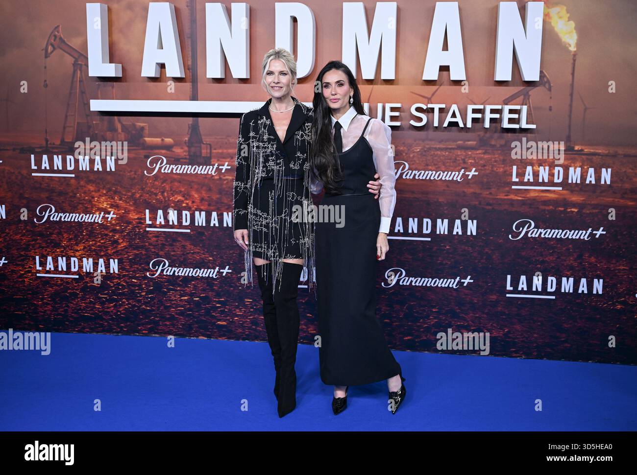 14 November 2025, Berlin: Actresses Ali Larter (l) and Demi Moore ...