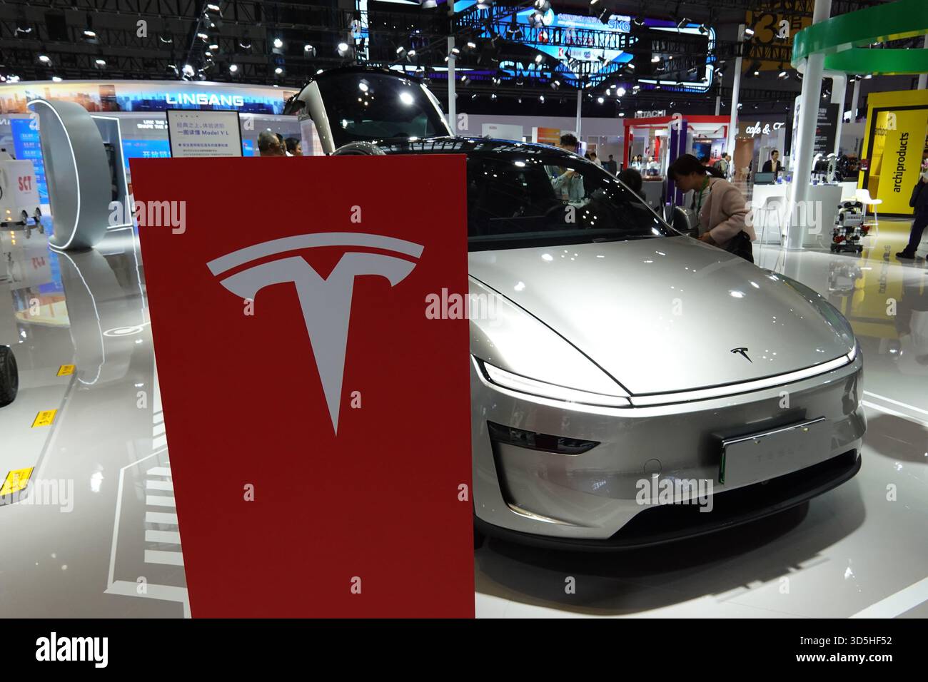 A silver Tesla electric vehicle is on display at the 8th China ...