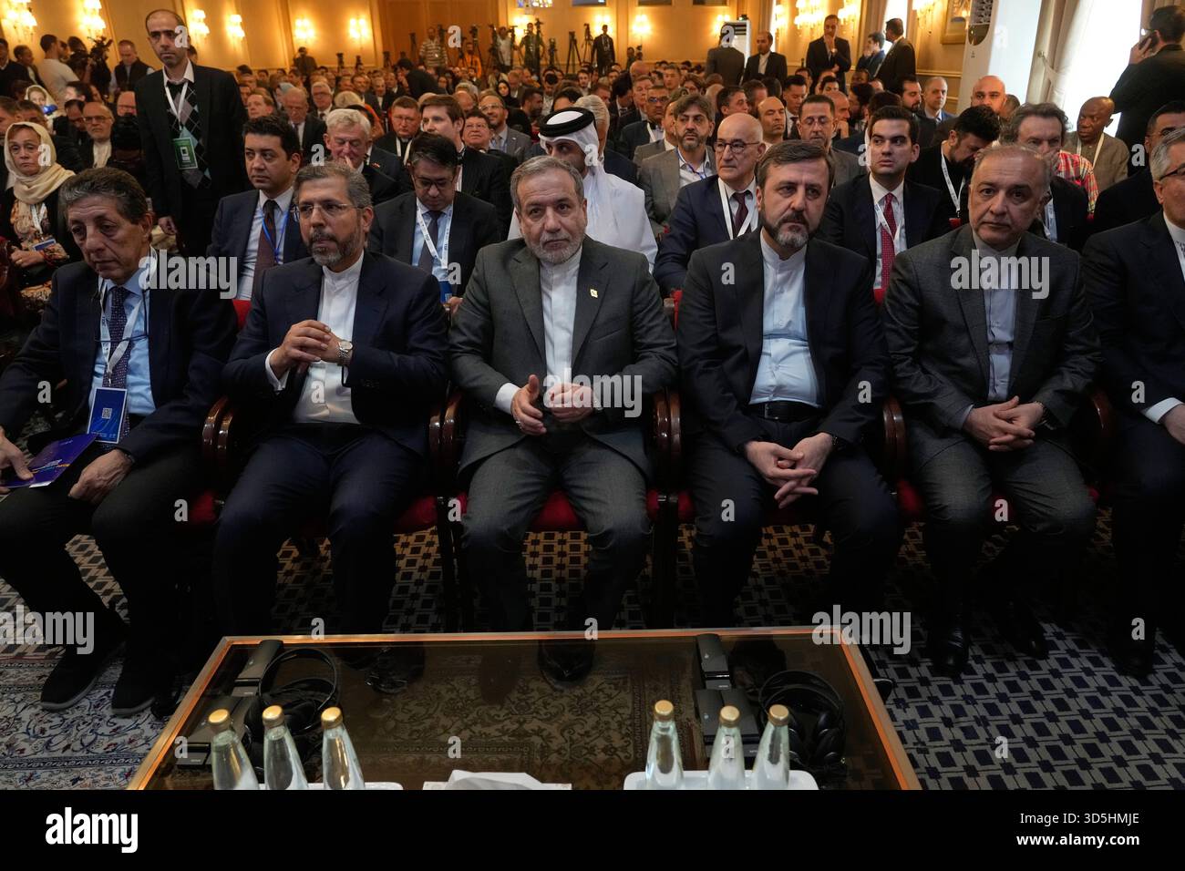 Iranian Foreign Minister Abbas Araghchi, center, attends a conference ...