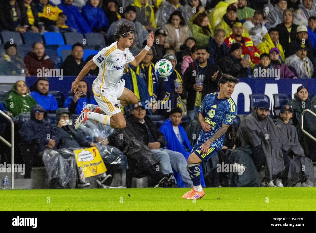 Los Angeles Galaxy's Julian Aude (3) and Club America's Alejandro ...