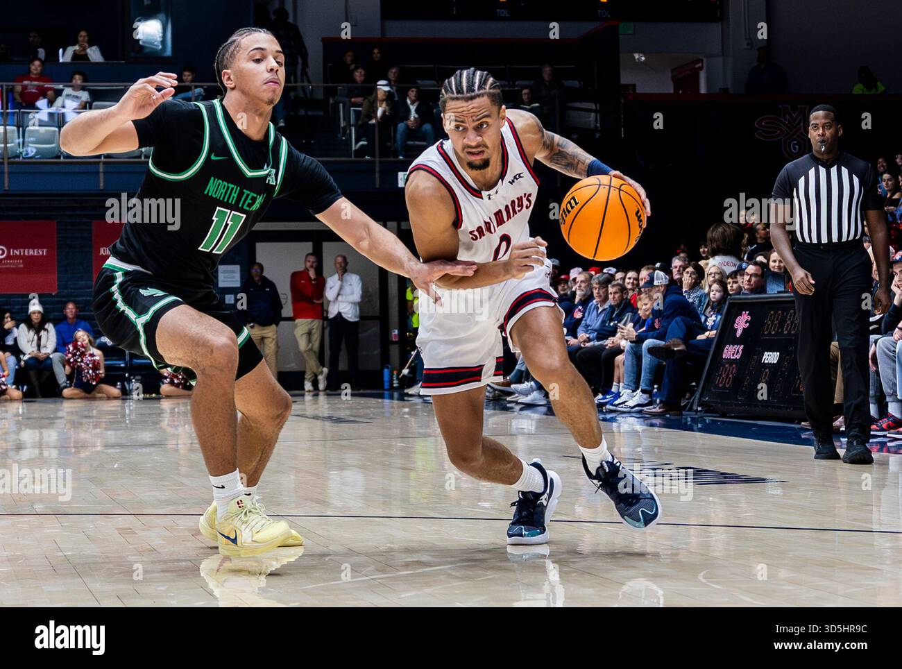 November 14 2025 Moraga CA, U.S.A. St. Marys guard Mikey Lewis (0)goes ...