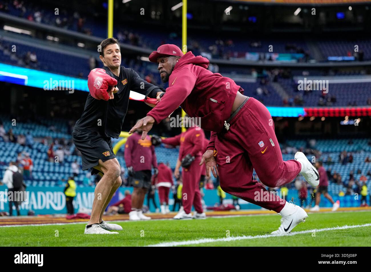 Washington Commanders defensive end Jacob Martin (55) warms-up before ...
