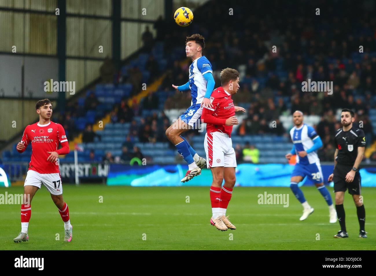 Kai Payne of Oldham Athletic goes for the high ball during the Oldham ...