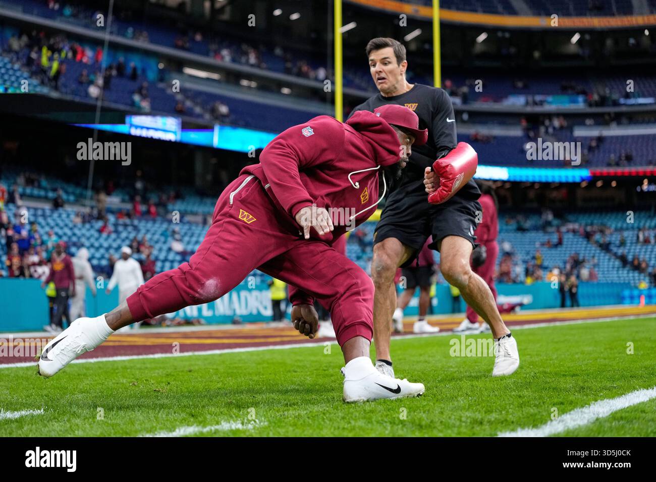 Washington Commanders defensive end Jacob Martin (55) warms-up before ...