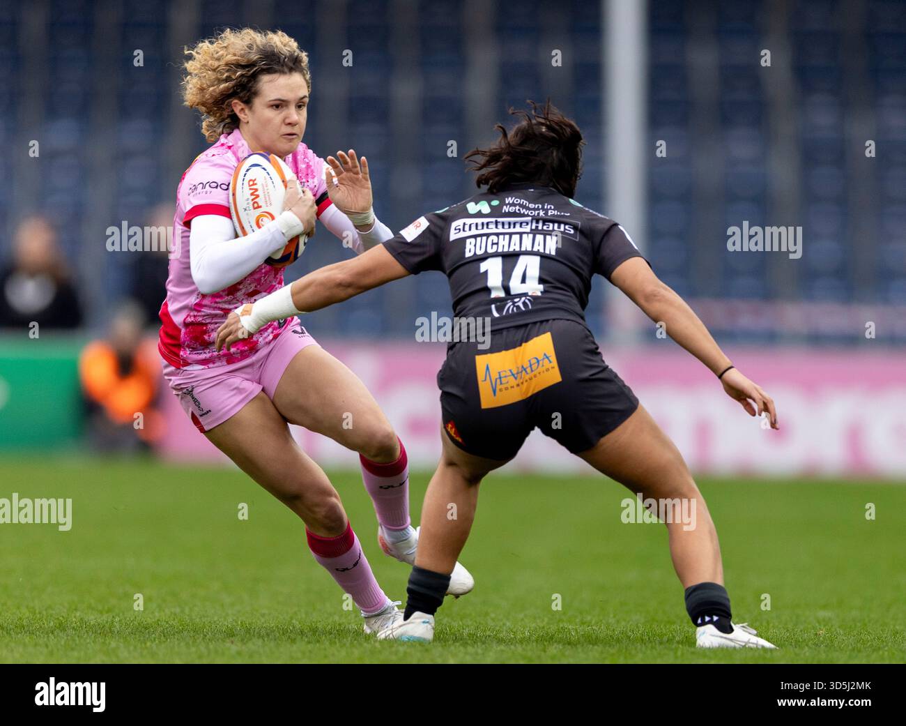 Harlequins Women’s Ellie Kildunne runs at Exeter Chiefs Women’s Katie ...