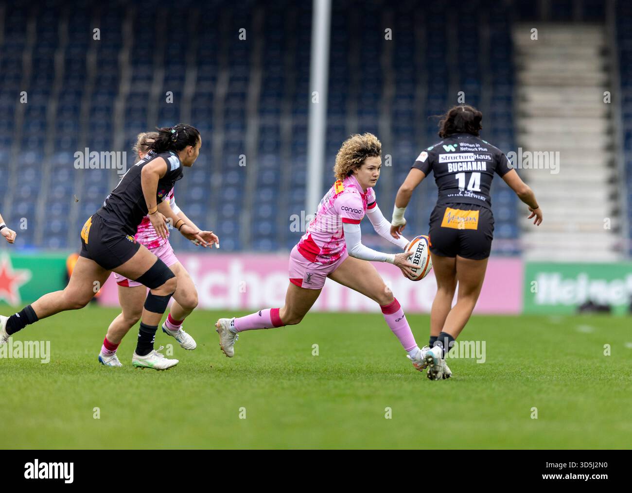 Harlequins Women’s Ellie Kildunne runs at Exeter Chiefs Women’s Katie ...