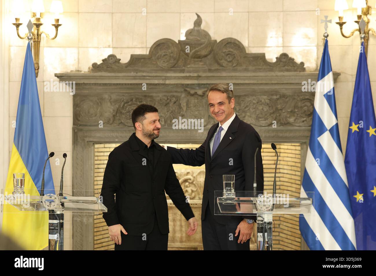 Greece's Prime Minister Kyriakos Mitsotakis, right, and Ukraine's ...