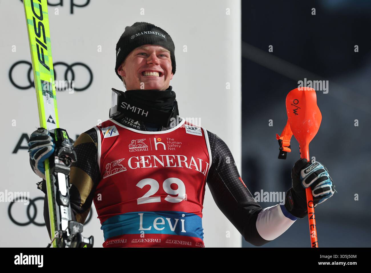 Finland's Eduard Hallberg celebrates on the podium his third place in a ...