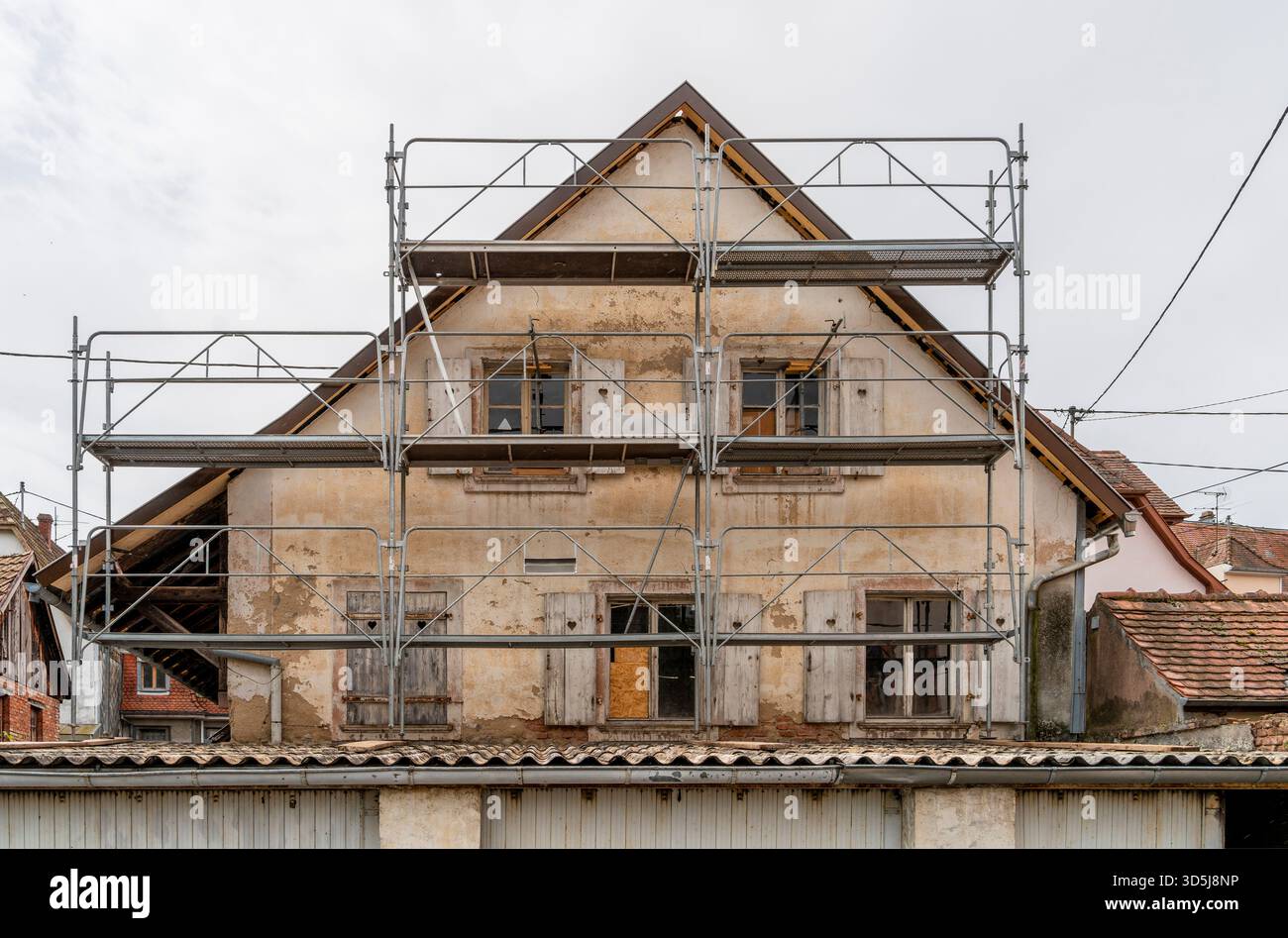 Rundown house facade and scaffold seen in munster hi-res stock ...