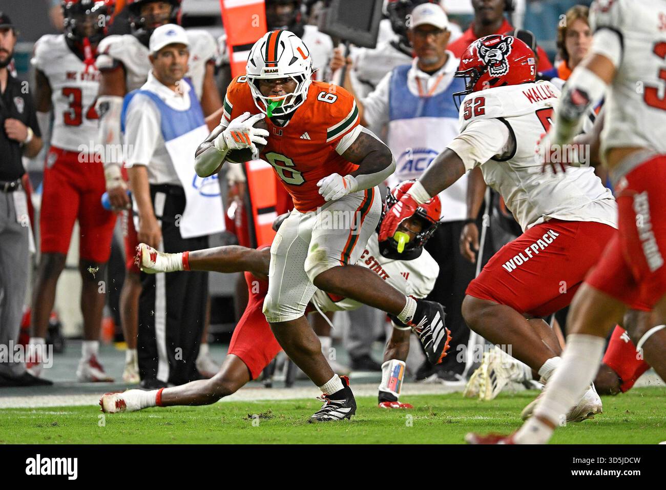 MIAMI GARDENS, FL - NOVEMBER 15: running back CharMar Brown (6) slips ...