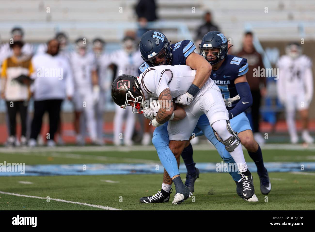 Columbia defensive end Joshua Powell (13) makes a tackle during an NCAA ...