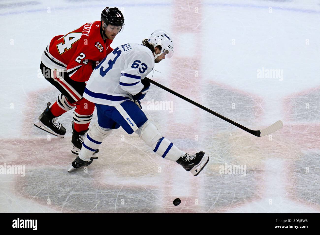 Toronto Maple Leafs left wing Matias MacCelli (63) moves the puck past ...