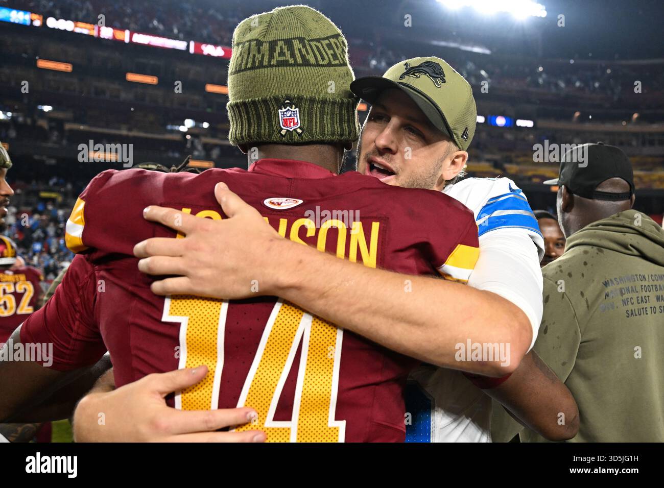 Detroit Lions quarterback Jared Goff, right, embraces Washington ...