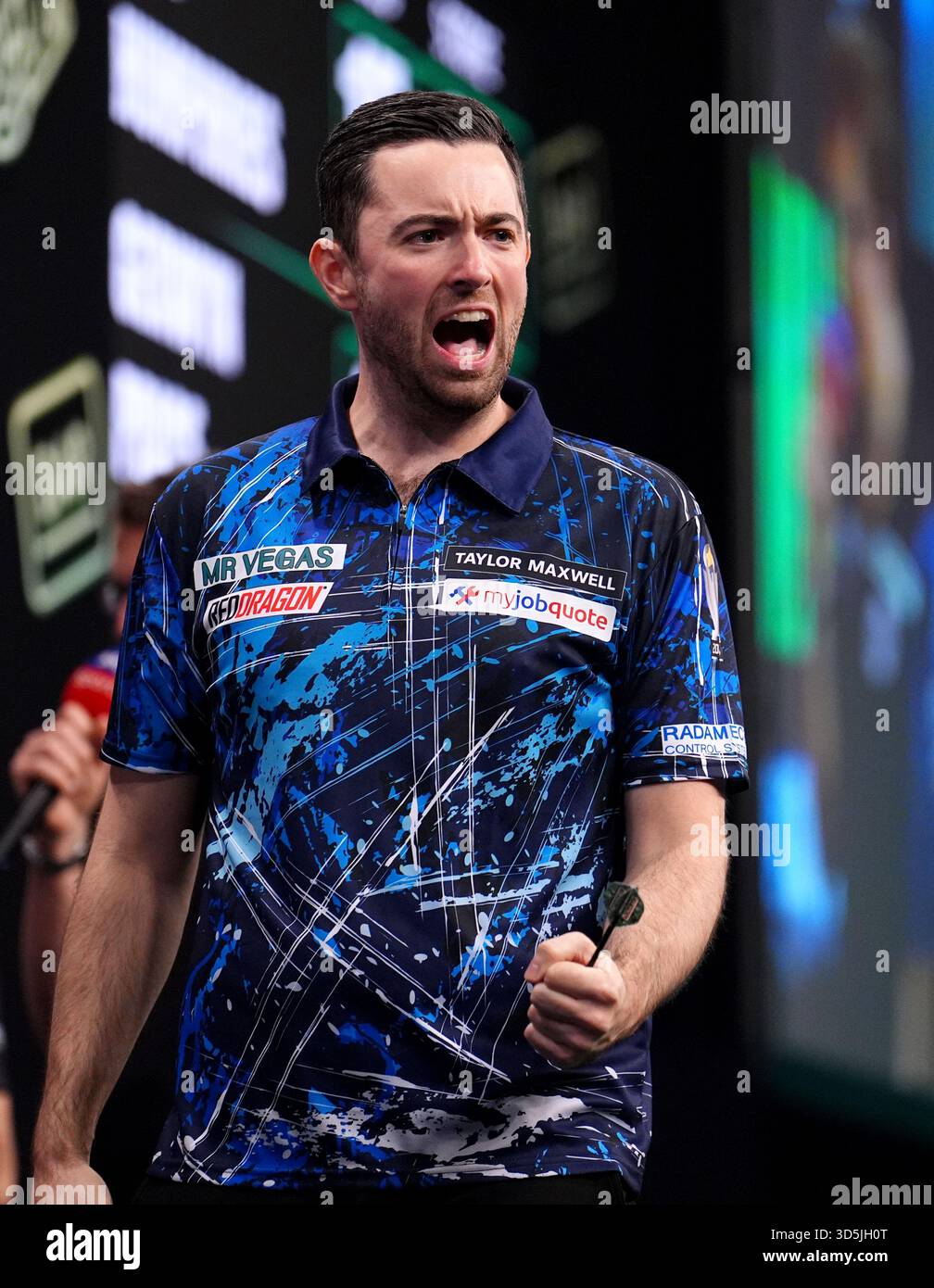 Luke Humphries celebrates winning his semi final match against Gerwyn ...