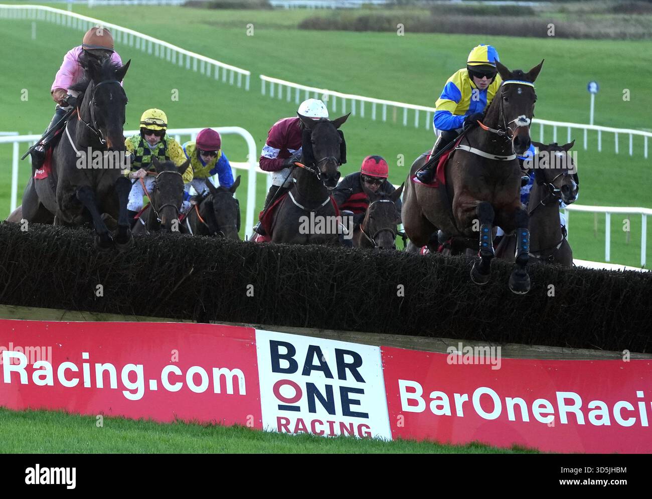 Answer To Kayf ridden by John Shinnick (right) on their way to winning ...