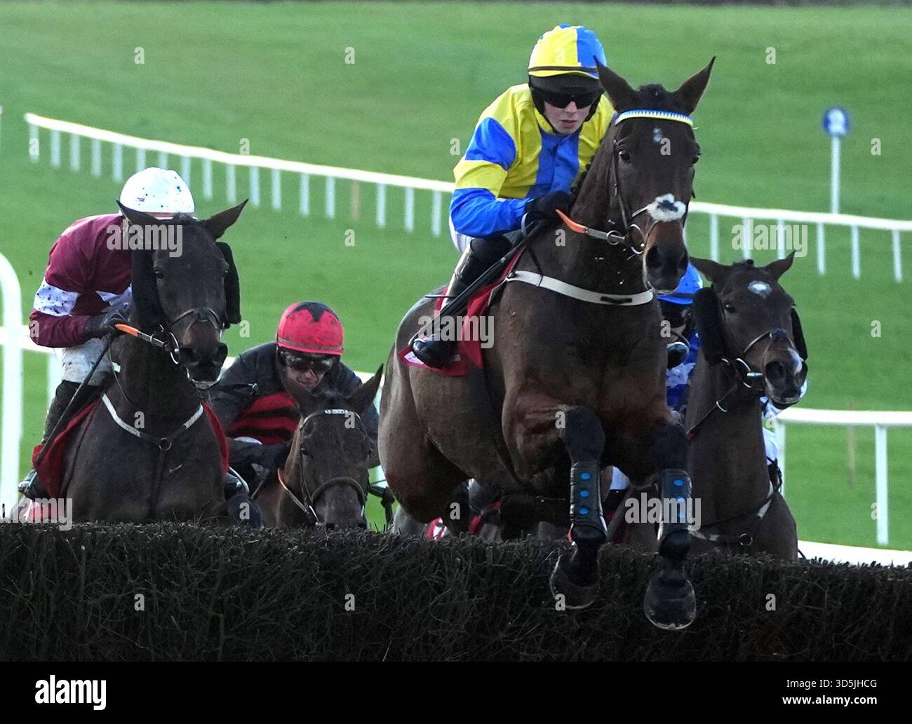 Answer To Kayf ridden by John Shinnick (right) on their way to winning ...